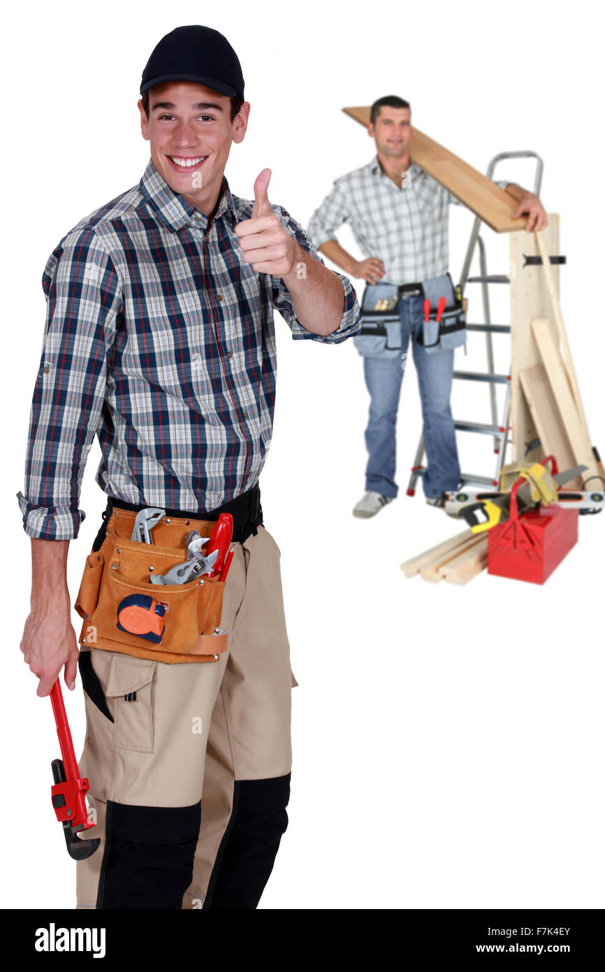 Two carpenter with step ladder Stock Photo - Alamy