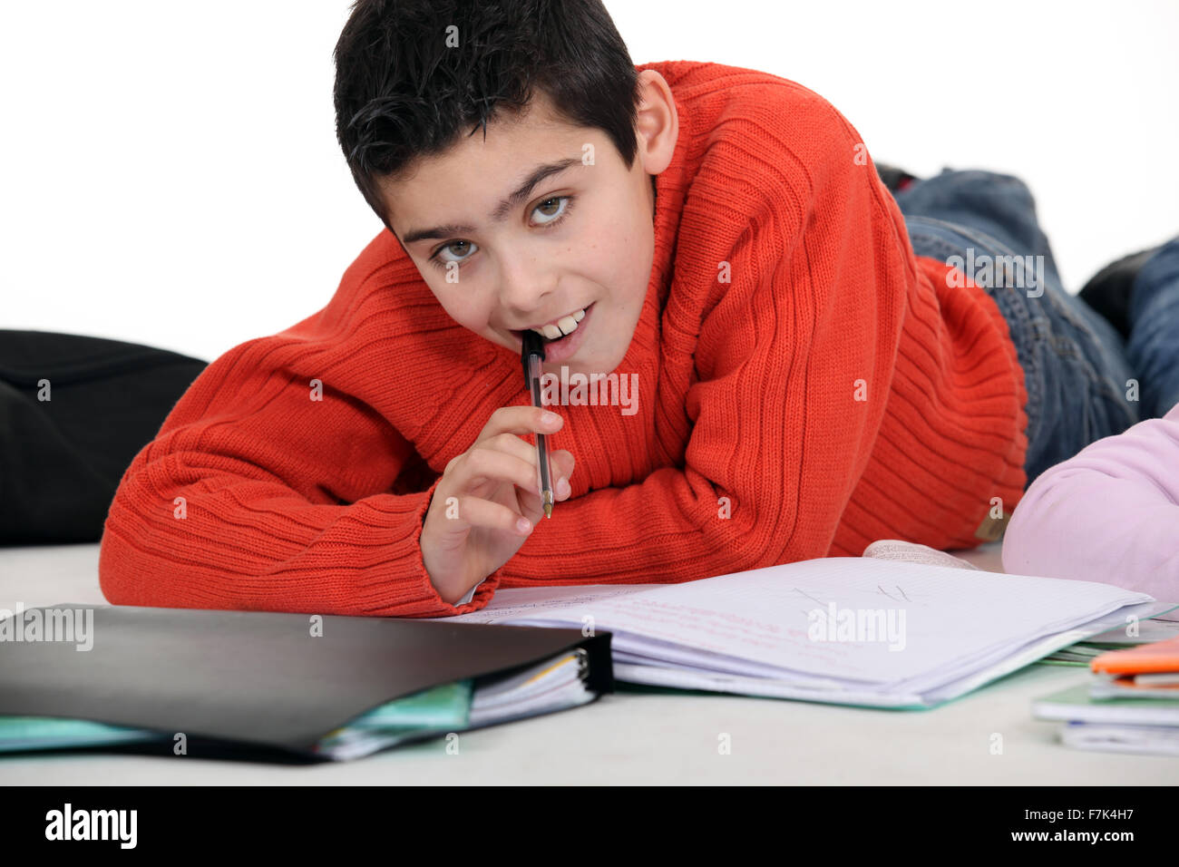 Student doing classwork hi-res stock photography and images - Alamy