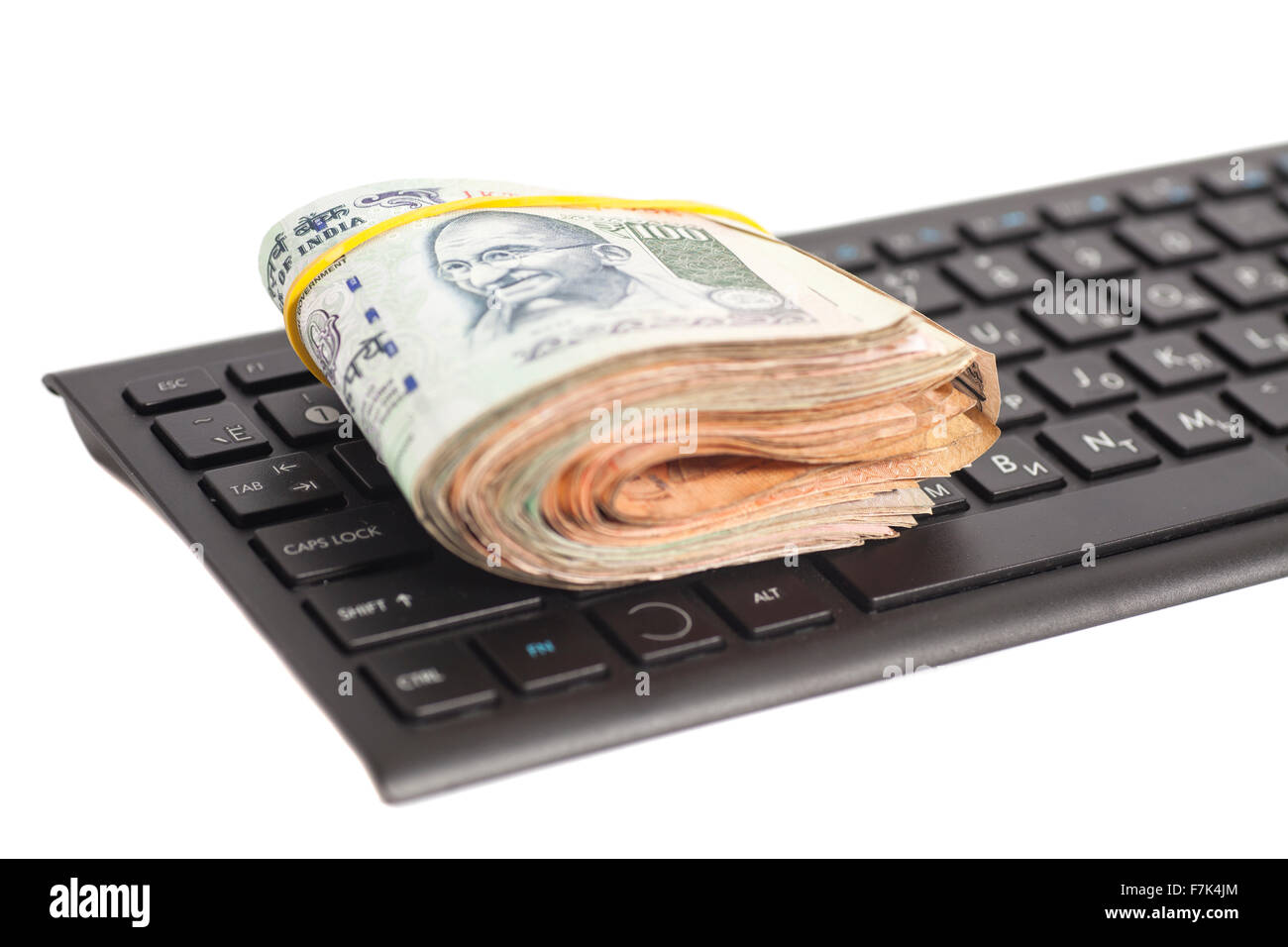 Money Indian Currency Rupee Notes on computer keyboard isolated on ...