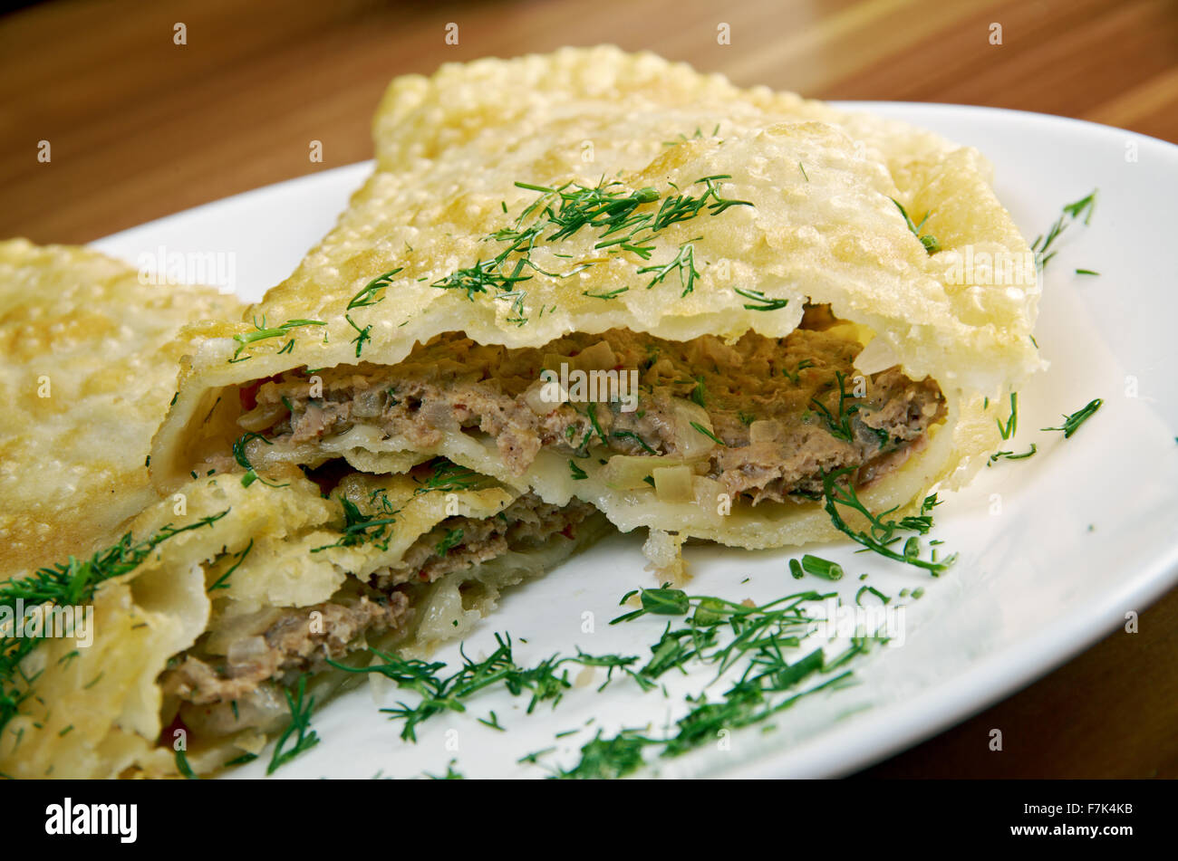 Cheburek with meat- traditional Caucasian dish.national dish of the ...