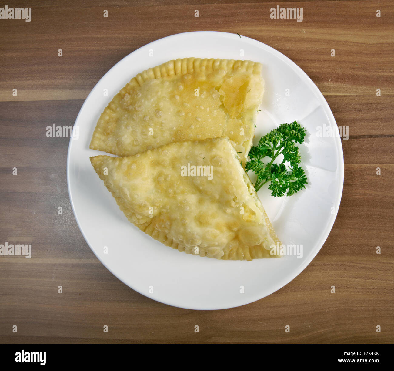 Cheburek with cheese- traditional Caucasian dish.national dish of the ...