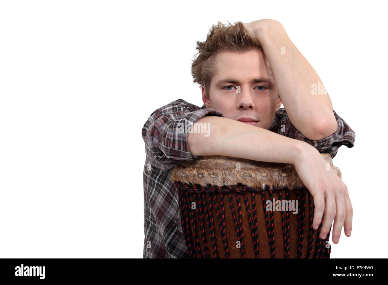 young man playing traditional drums Stock Photo - Alamy