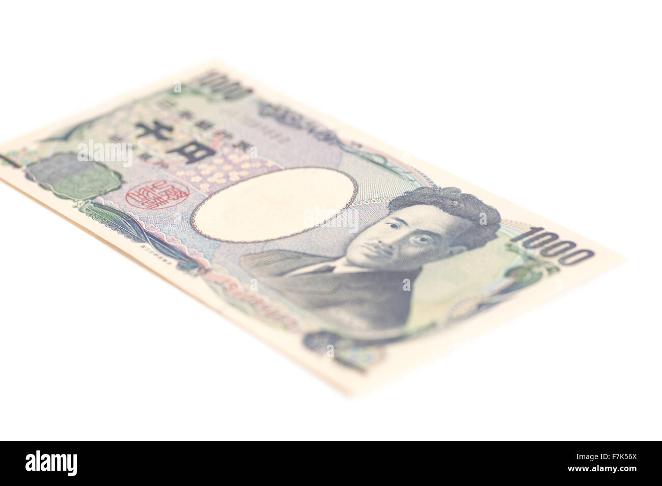Banknote of the Japanese 1000 Yen isolated on white Stock Photo - Alamy