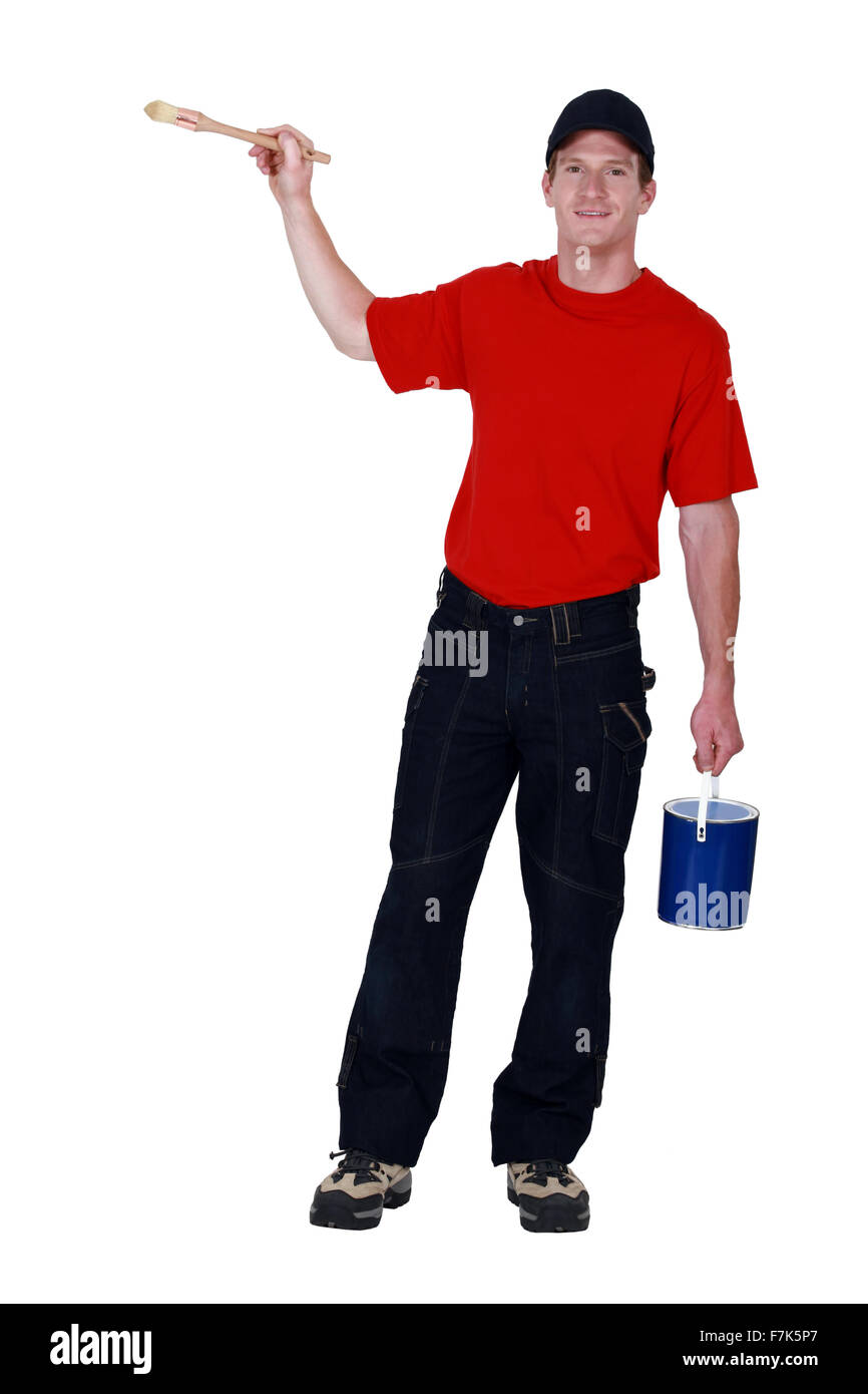 Painter pointing with brush Stock Photo - Alamy