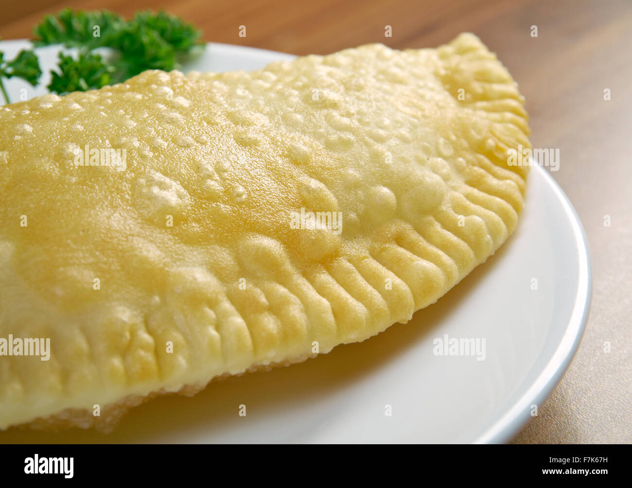 Cheburek with cheese- traditional Caucasian dish.national dish of the ...