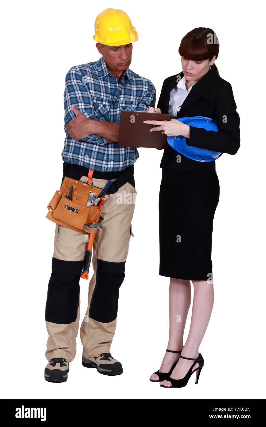 Engineer signing a form Stock Photo - Alamy