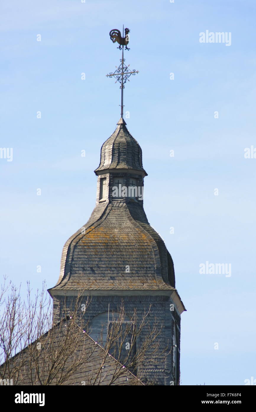 old church tower covered with moss and a weather vane Stock Photo - Alamy