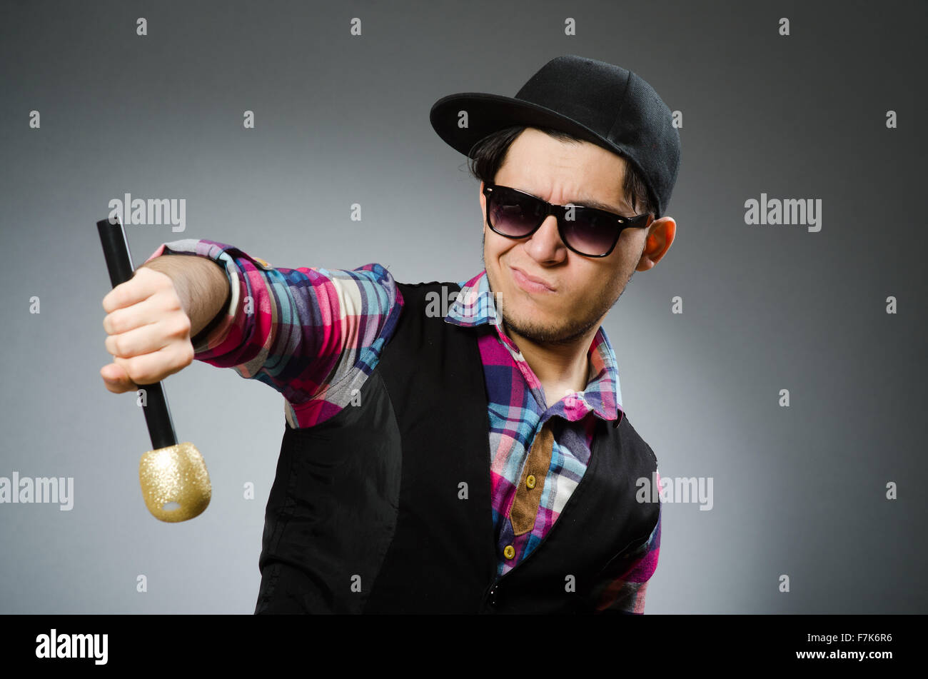 Funny man singing in karaoke Stock Photo - Alamy
