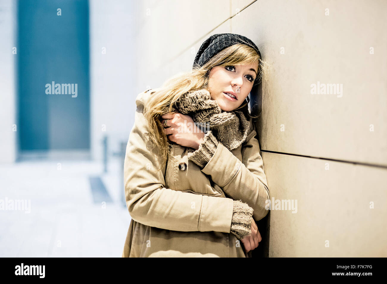 Sad woman walking around the city Stock Photo - Alamy