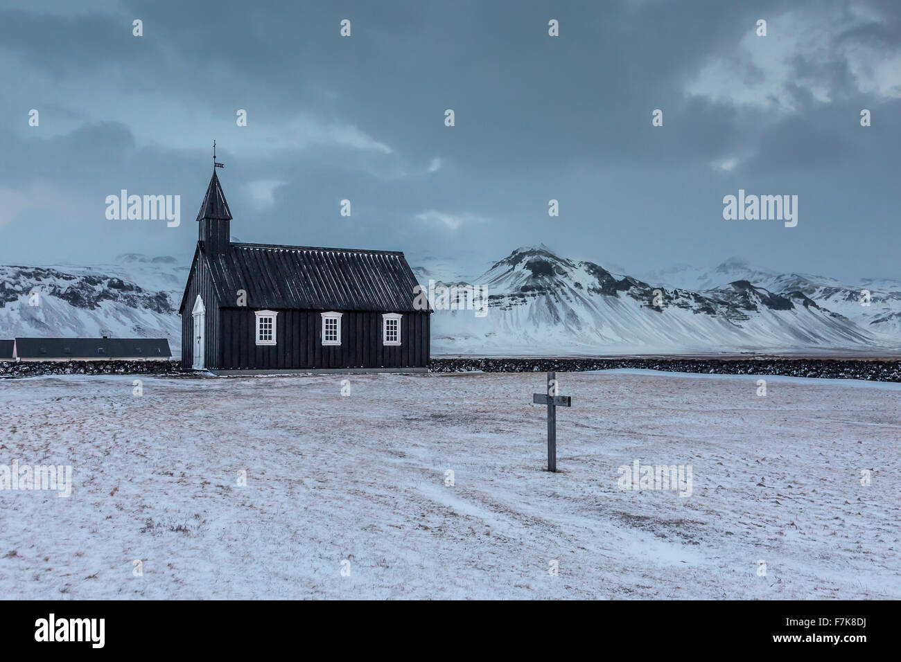 Church and graveyard in snowy remote mountain landscape, Budir ...