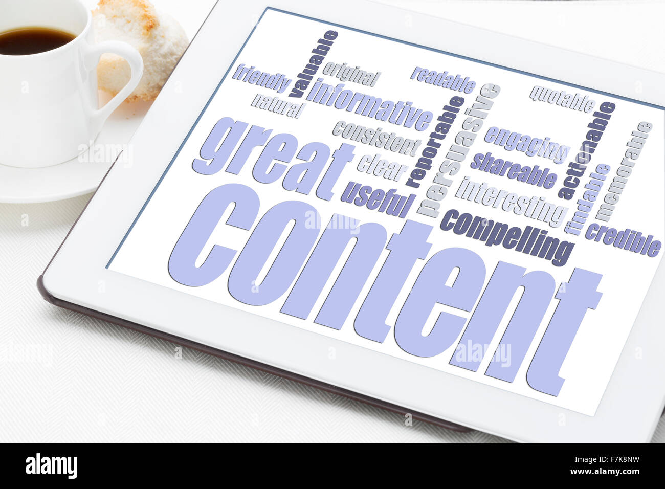great content word cloud on a digital tablet with a cup of coffee ...
