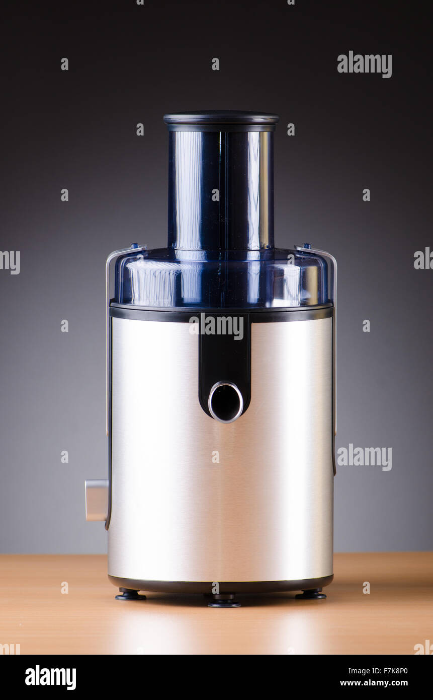 Juice extractor in kitchenware concept Stock Photo - Alamy