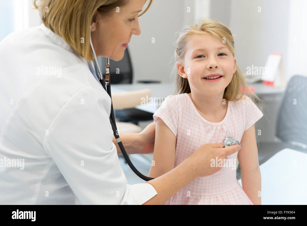 Girl heartbeat stethoscope hi-res stock photography and images - Alamy