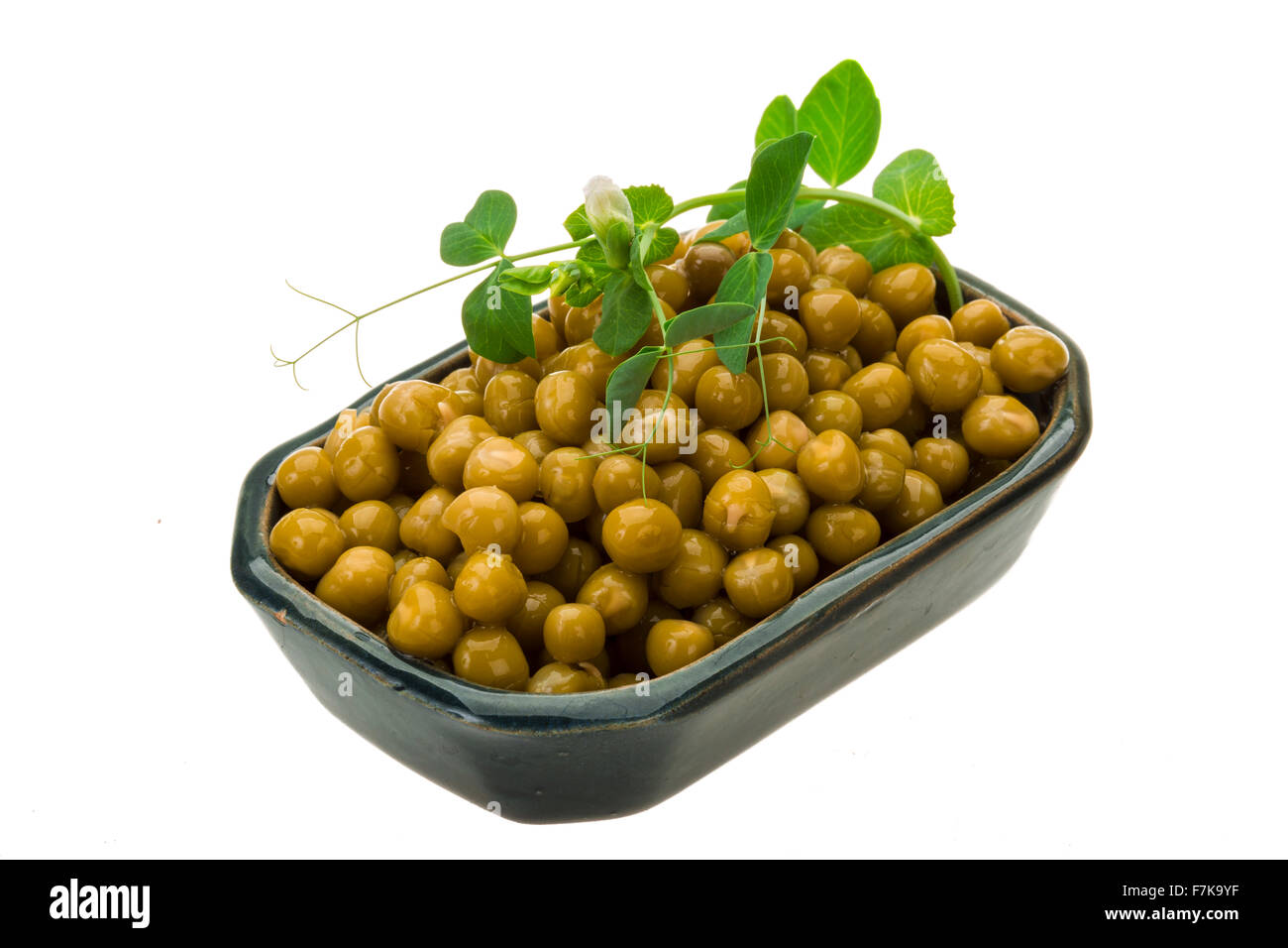 Marinated green peas with branch Stock Photo - Alamy