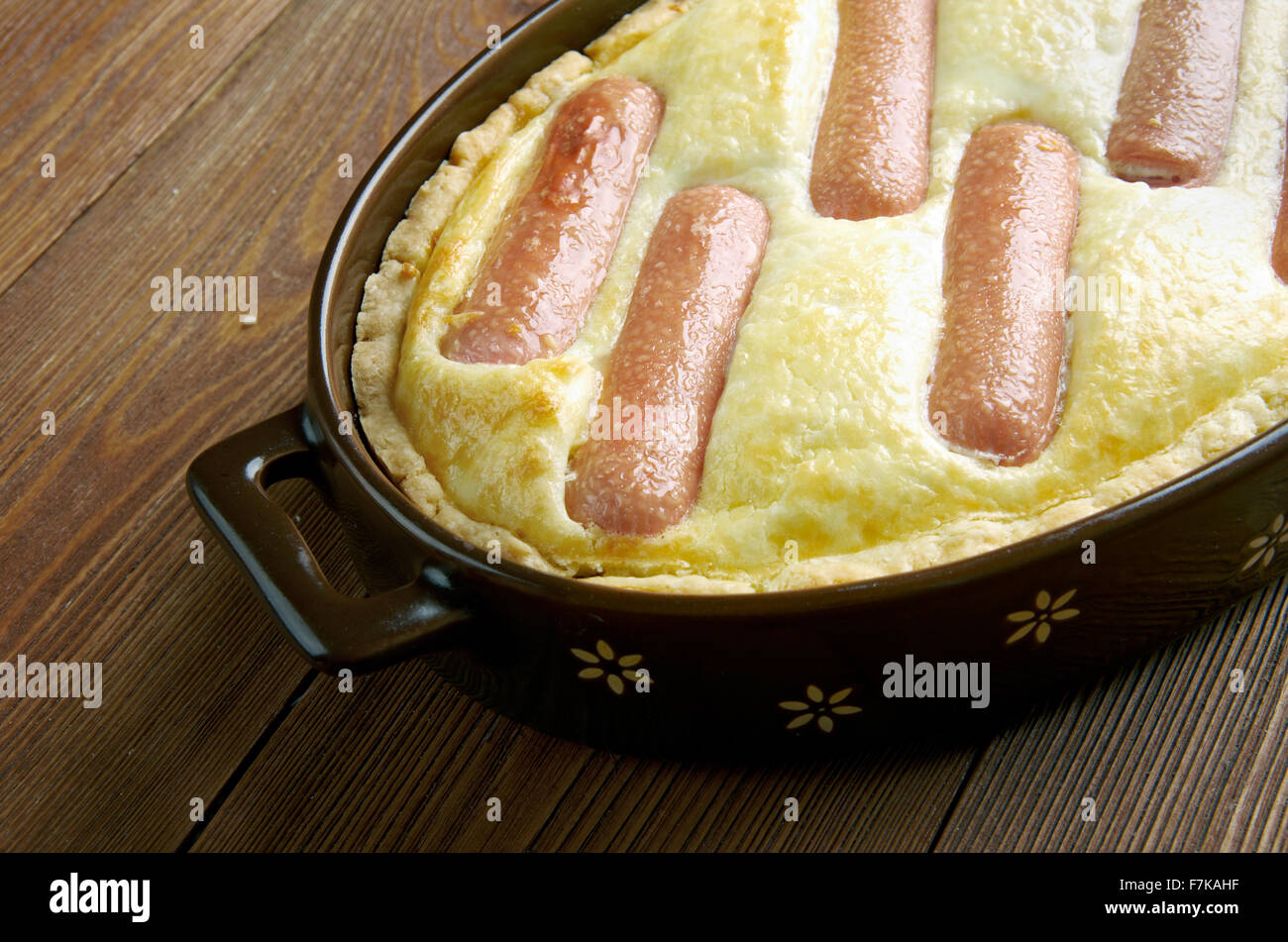 Toad in the hole - traditional British dish consisting of sausages in ...