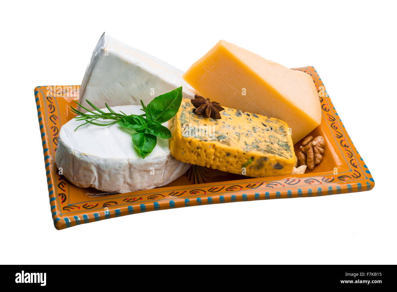 Variety cheese assortment with nuts and herbs Stock Photo - Alamy