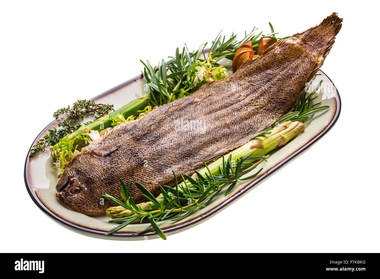 Fish Dover sole roasted Stock Photo - Alamy