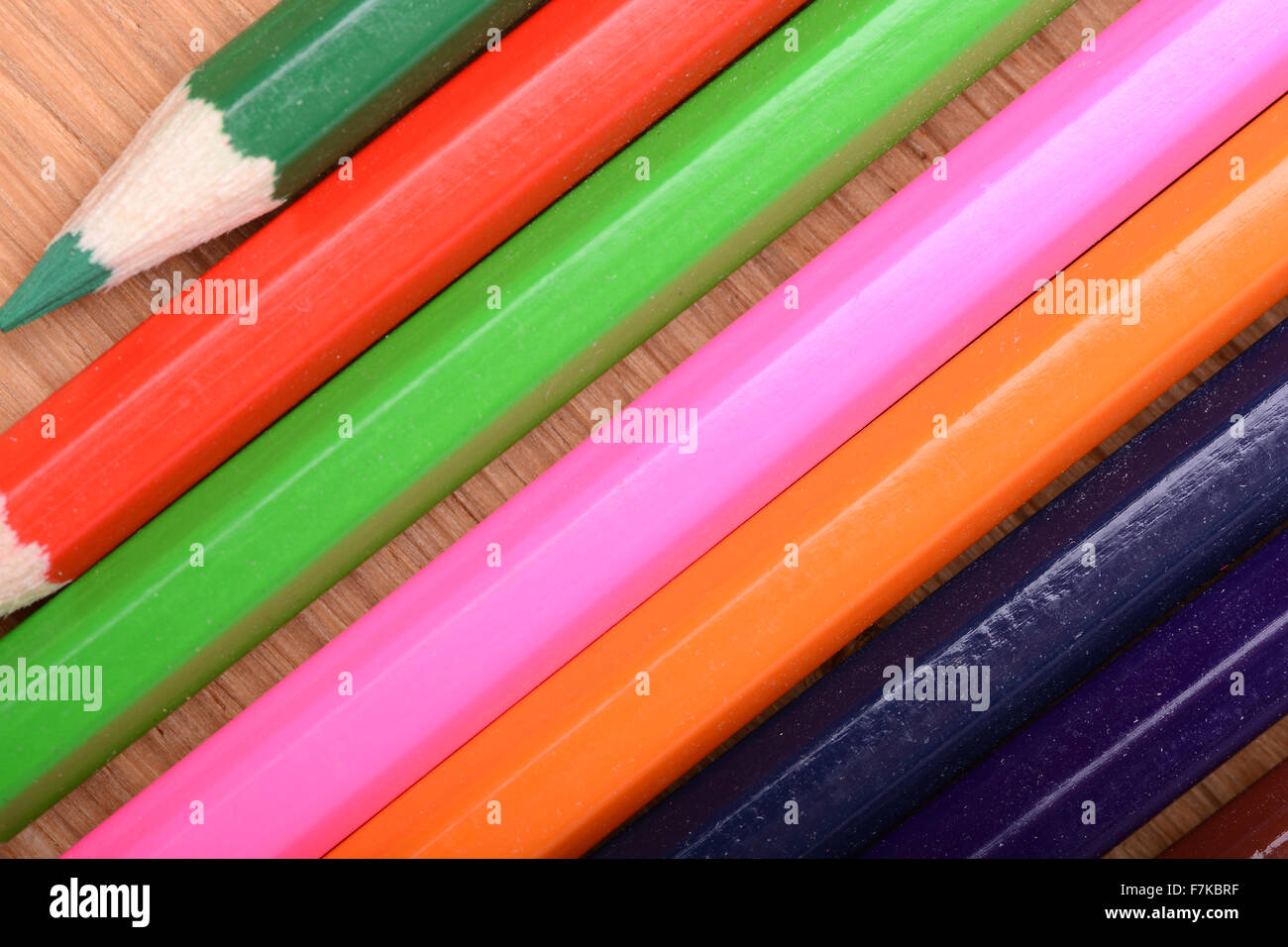 Frame of old Colour pencils on Old wooden plate texture background ...