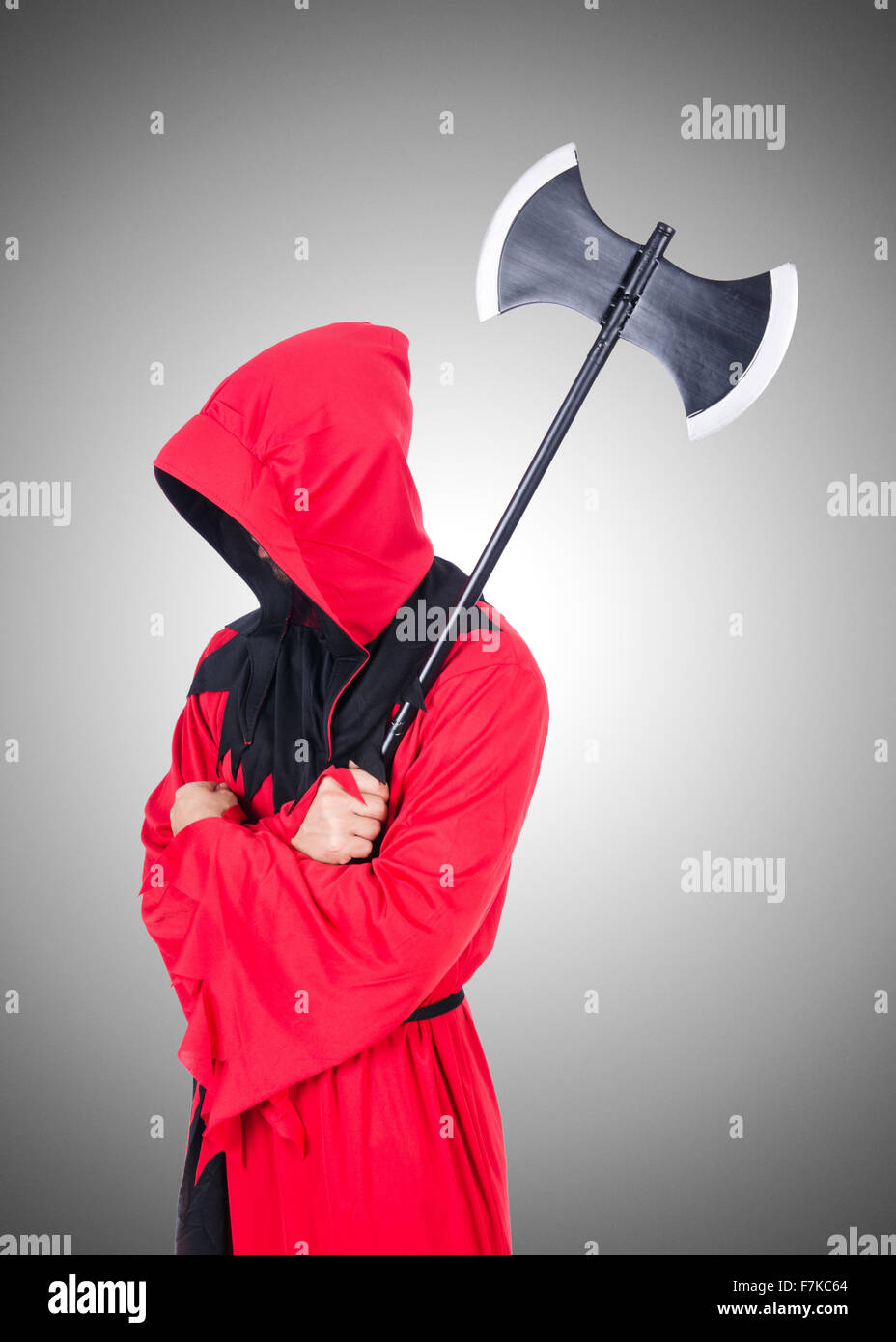 Executioner in red costume with axe on white Stock Photo - Alamy