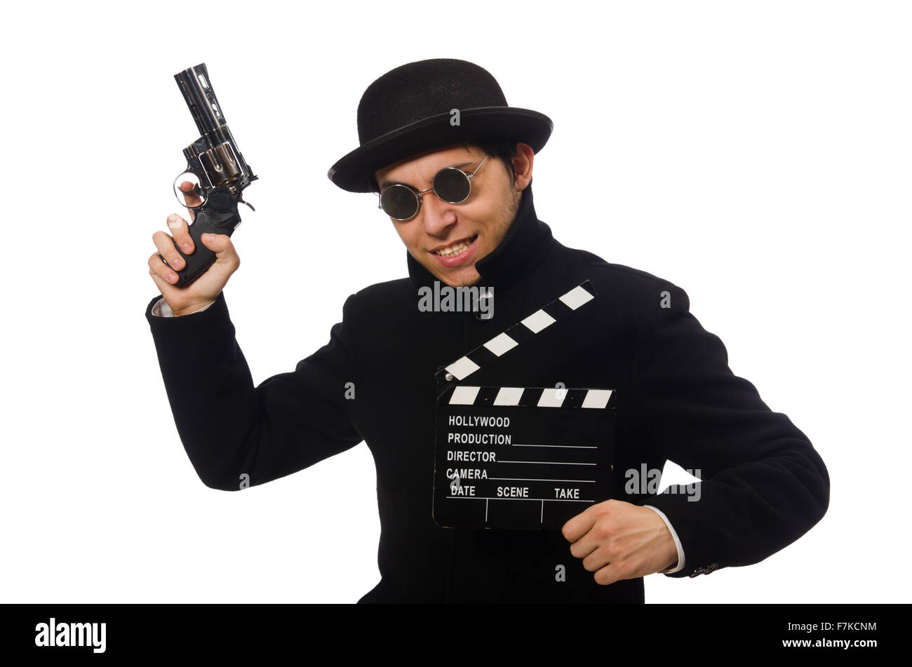 Young man with gun and clapper-board isolated on white Stock Photo - Alamy