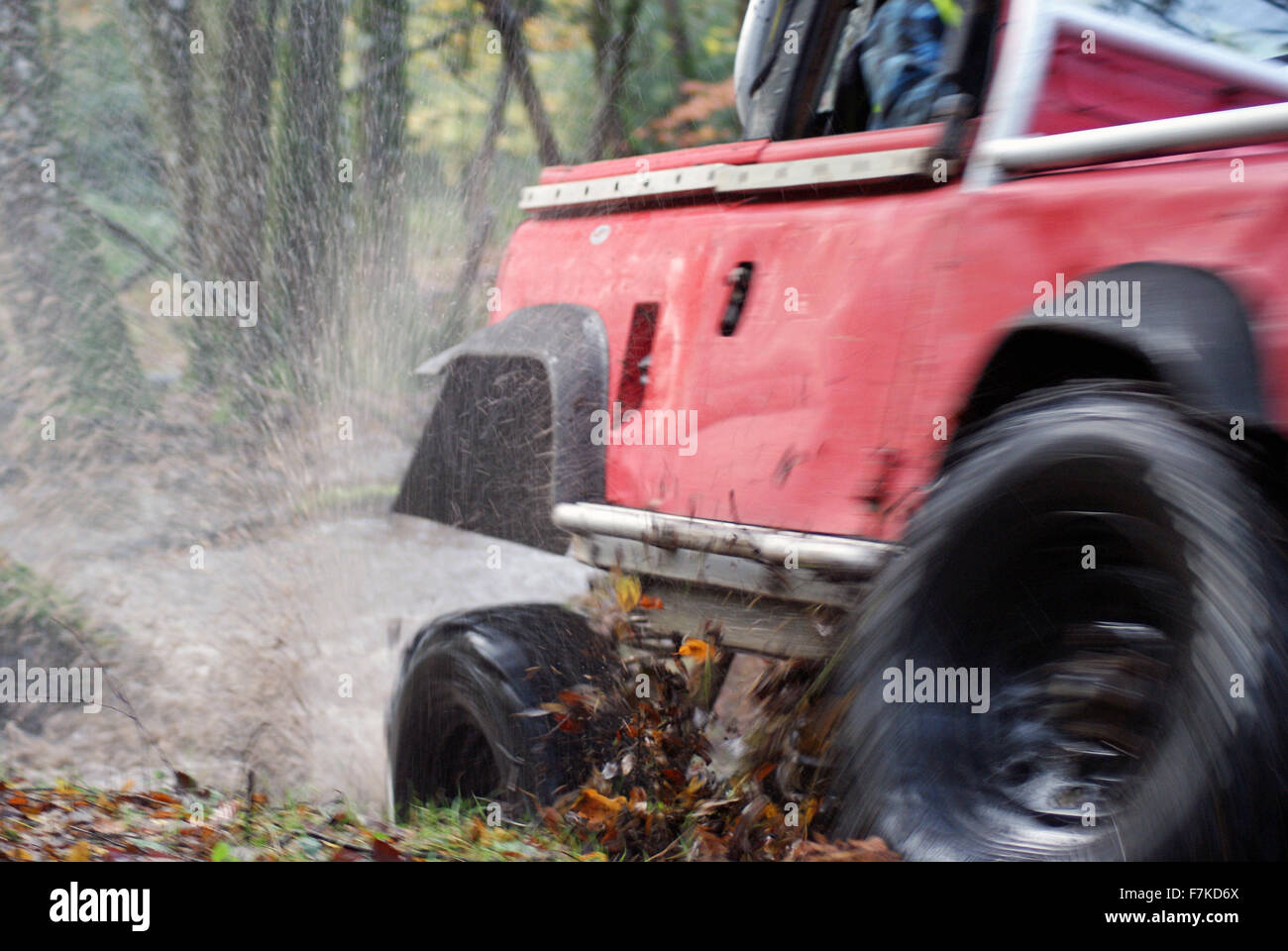 Land Rover, 4X4 wheels in motion, Leaves and water spray Stock Photo ...