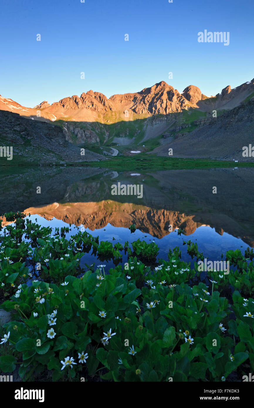 Mountains reflected on pond near Clear Lake, San Juan National Forest ...