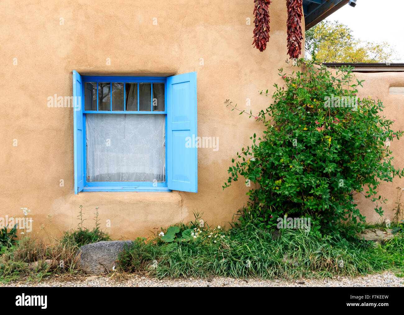 A window detail of an adobe house in Taos,New Mexico Stock Photo - Alamy
