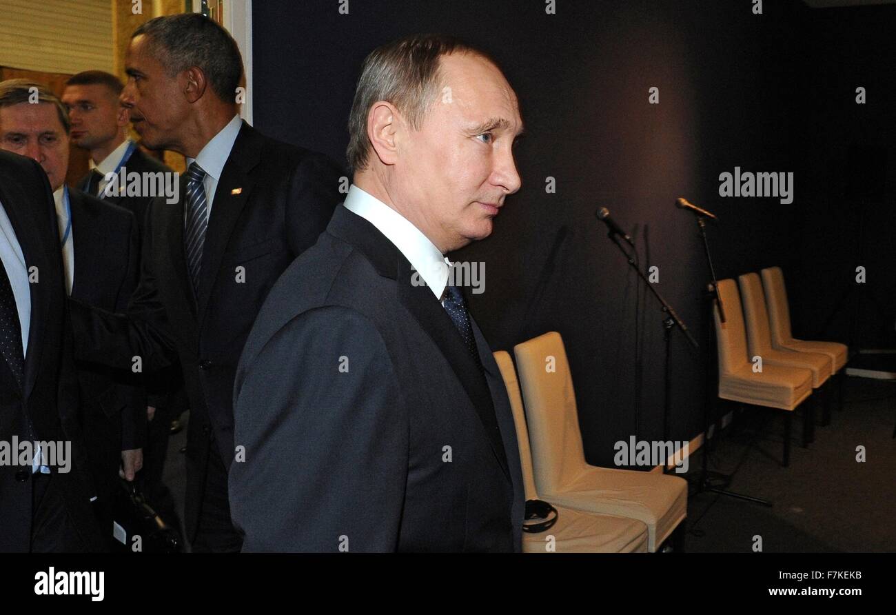Russian President Vladimir Putin walks into the meeting room for a ...