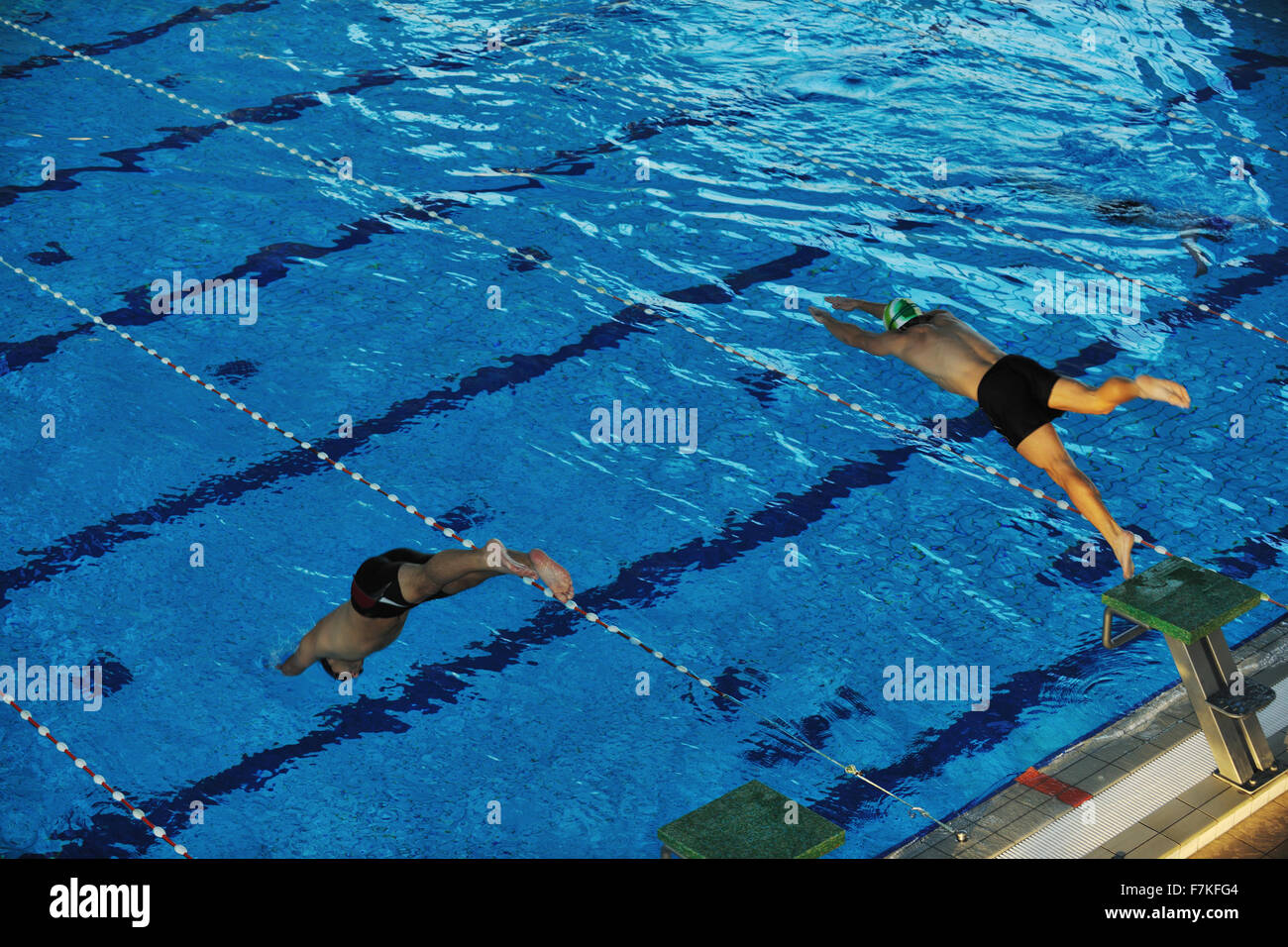 start position race concept with fit swimmer on swimming pool Stock ...
