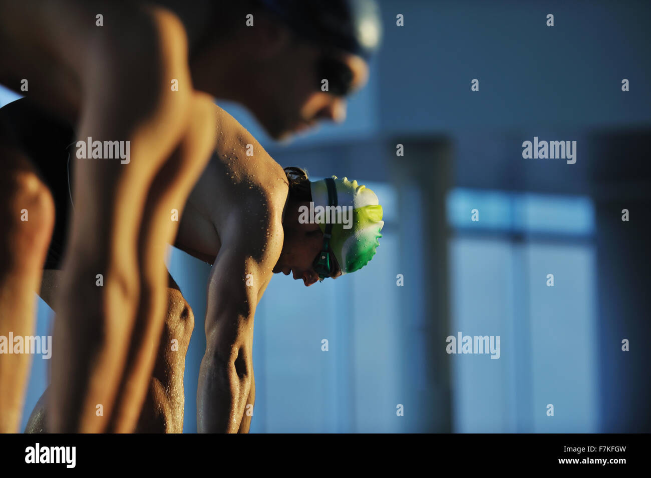 start position race concept with fit swimmer on swimming pool Stock ...