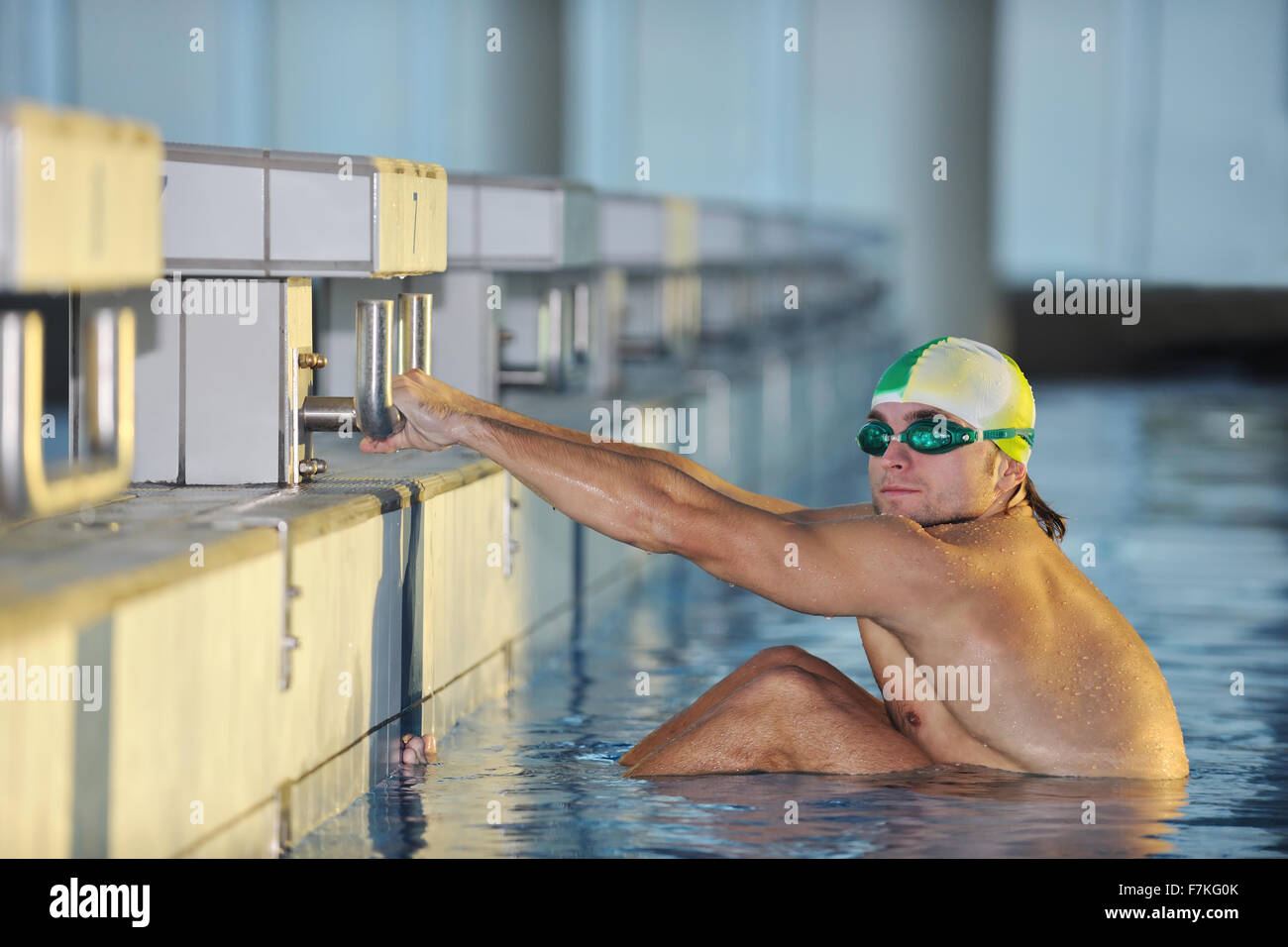 start position race concept with fit swimmer on swimming pool Stock ...