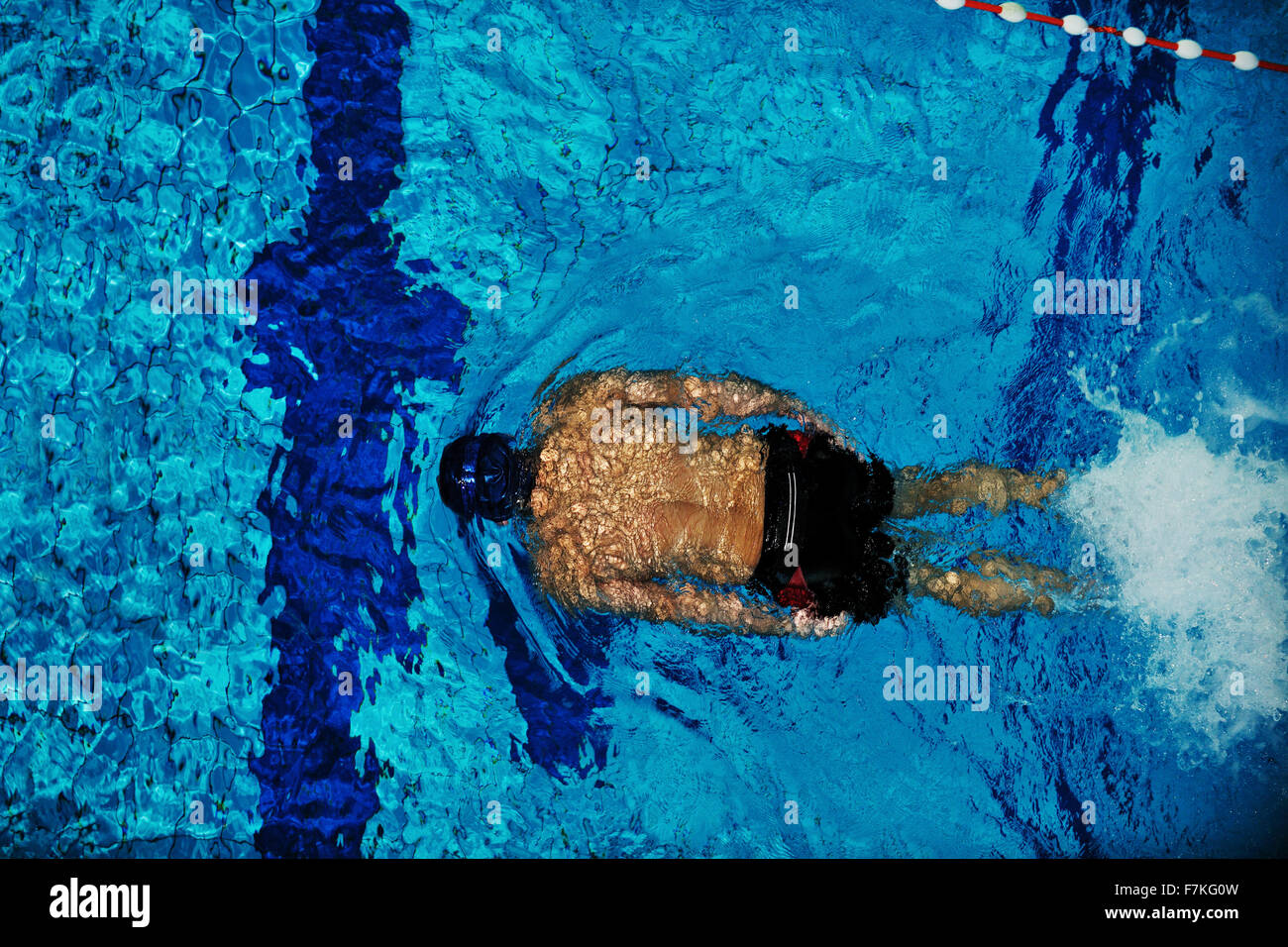 start position race concept with fit swimmer on swimming pool Stock ...