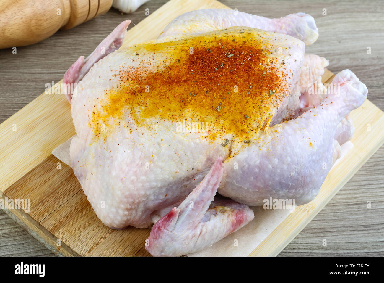 Raw chicken with spices ready for cooking Stock Photo - Alamy