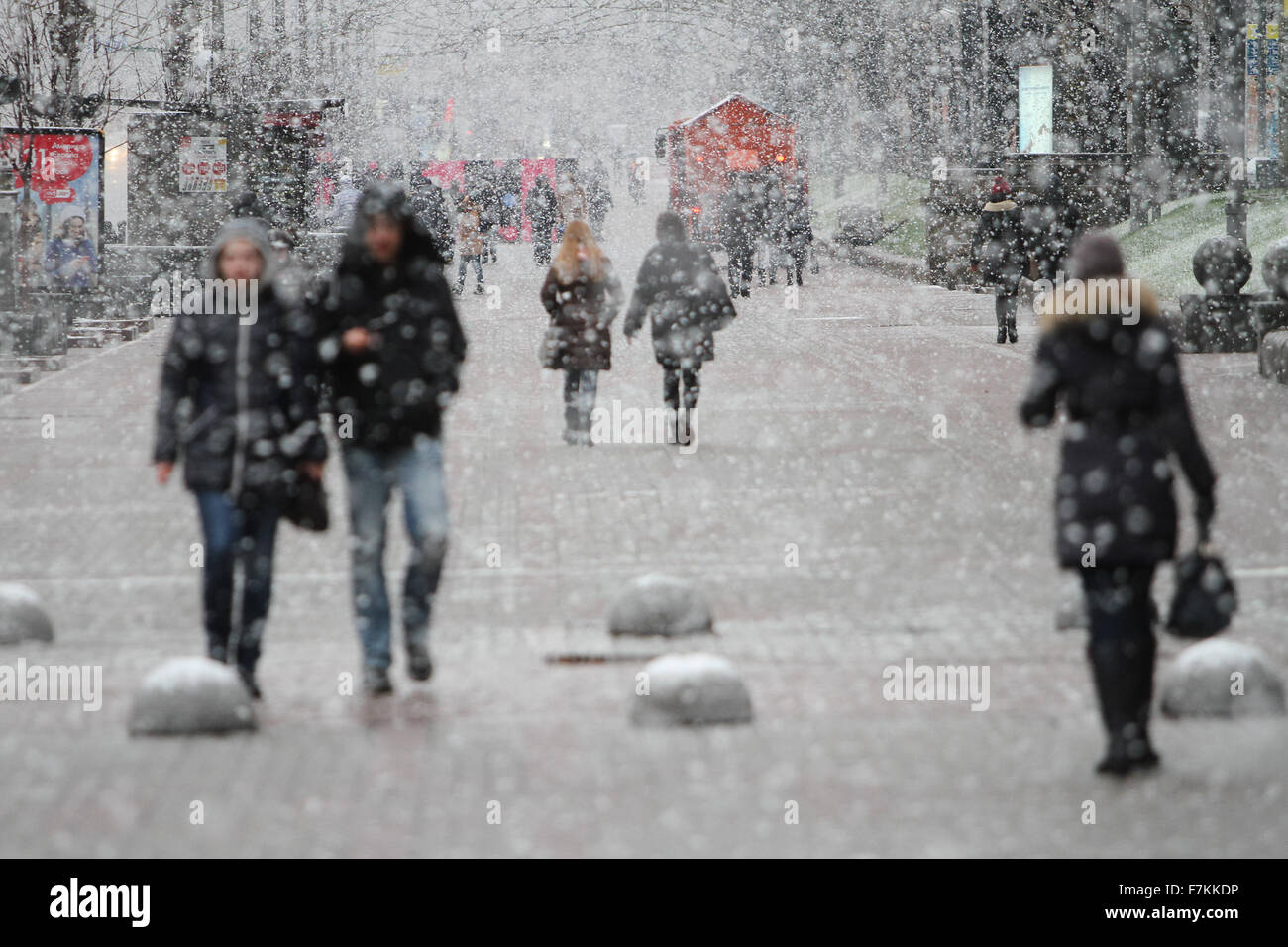 Kiev, Ukraine. 01st Dec, 2015. People walk during a snowfall in ...
