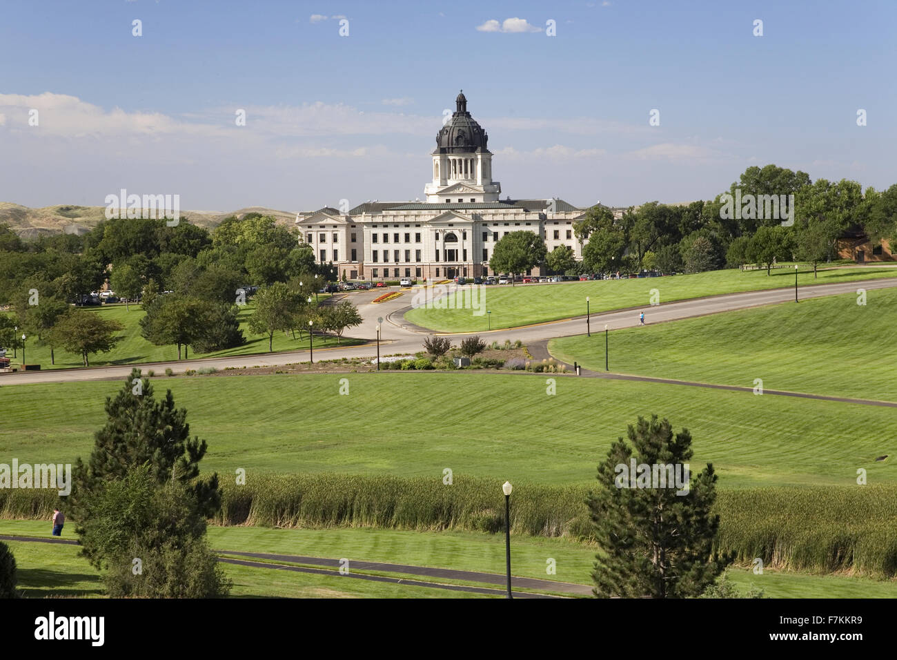 Green grass of park leading to South Dakota State Capitol and complex ...