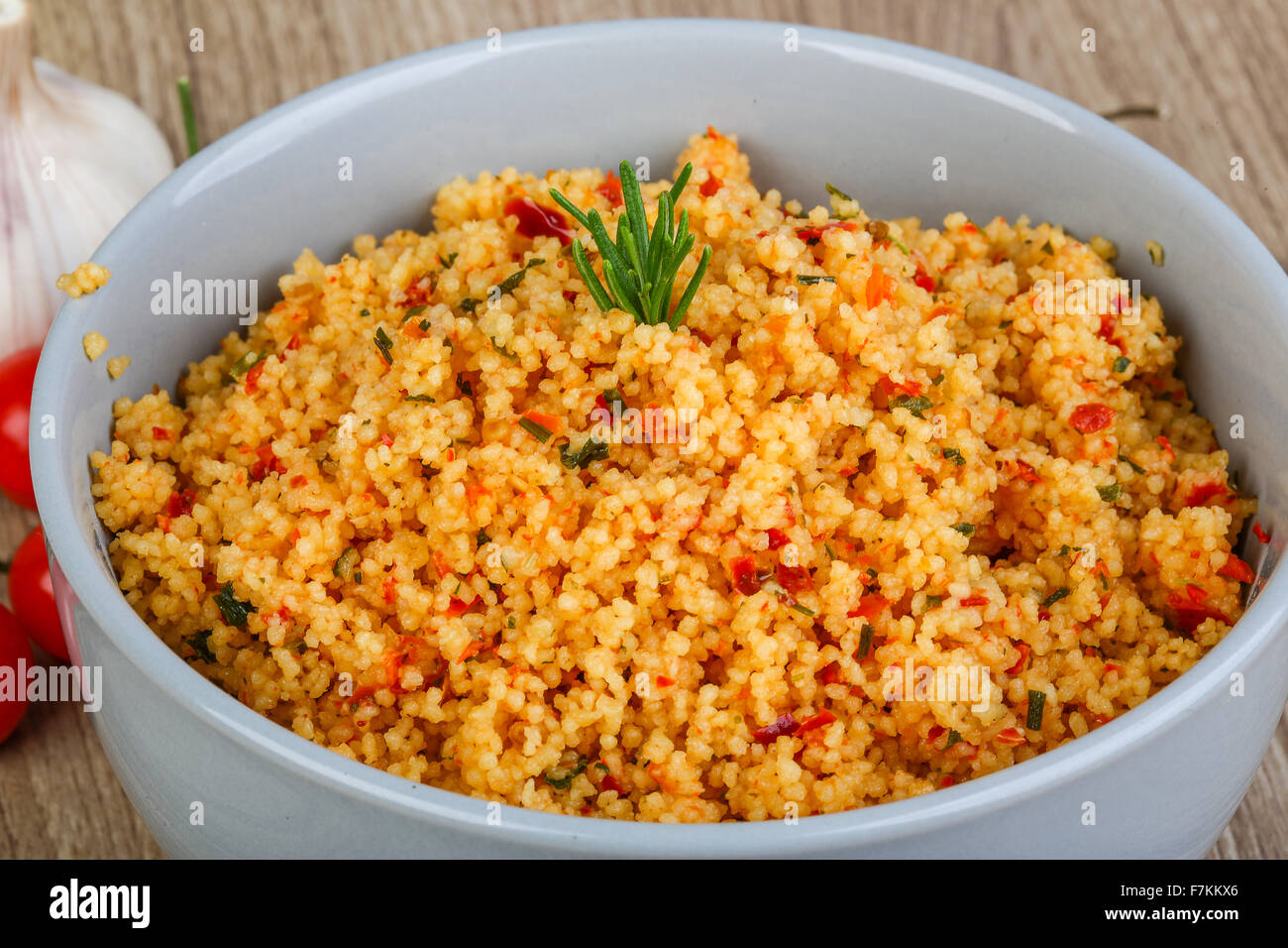 Arabic traditional cuisine - Couscous with tomato and green onion Stock ...