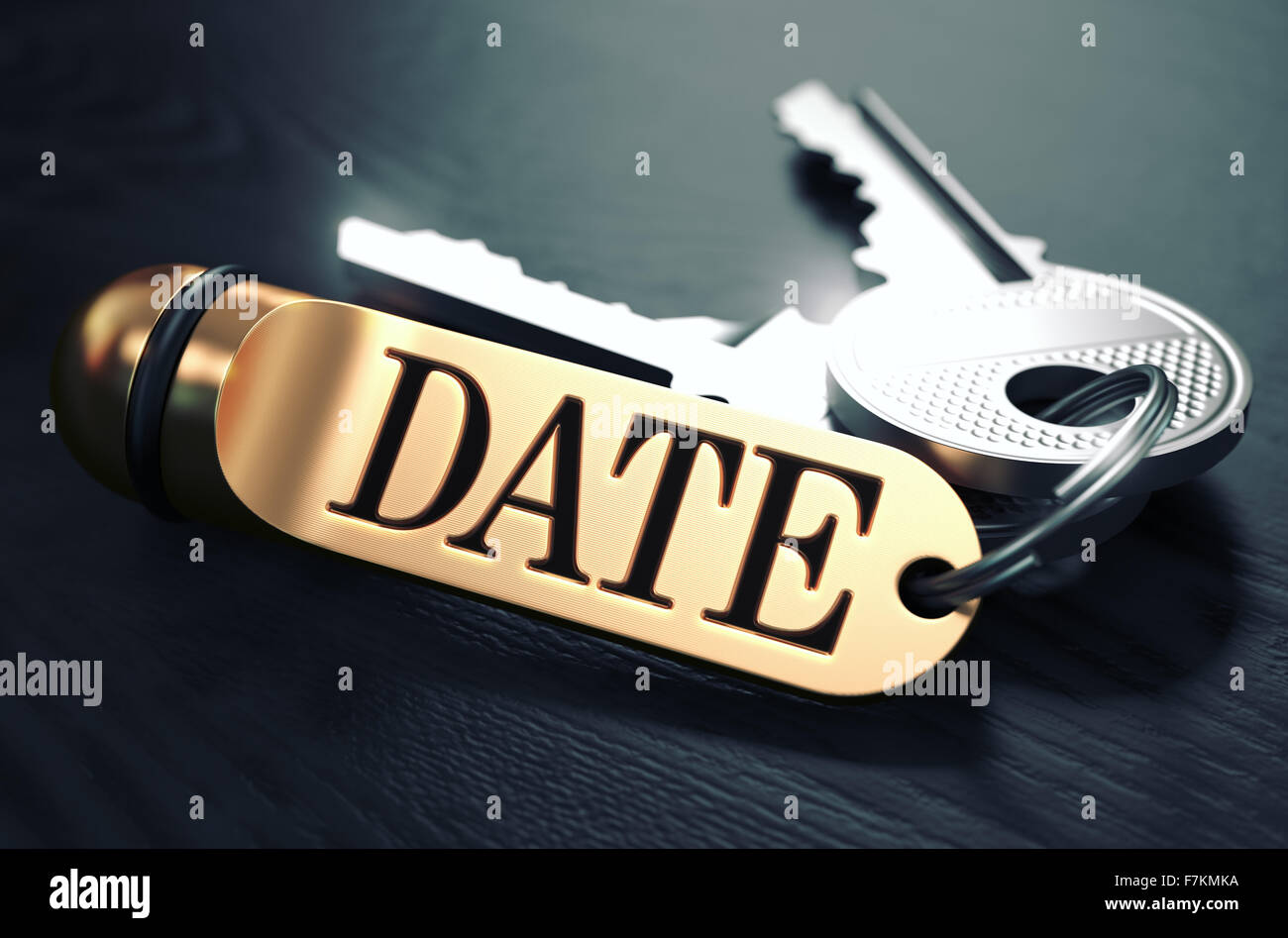 Keys with Word Date on Golden Label Stock Photo - Alamy