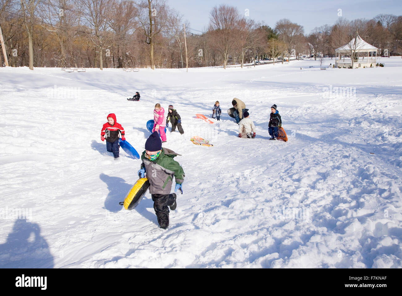Kids playing slide riding hi-res stock photography and images - Alamy