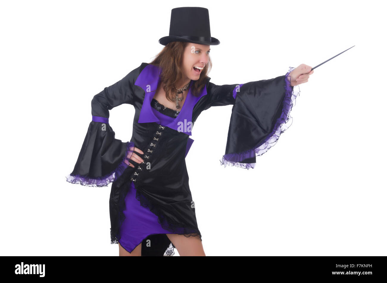Woman magician isolated on the white Stock Photo - Alamy