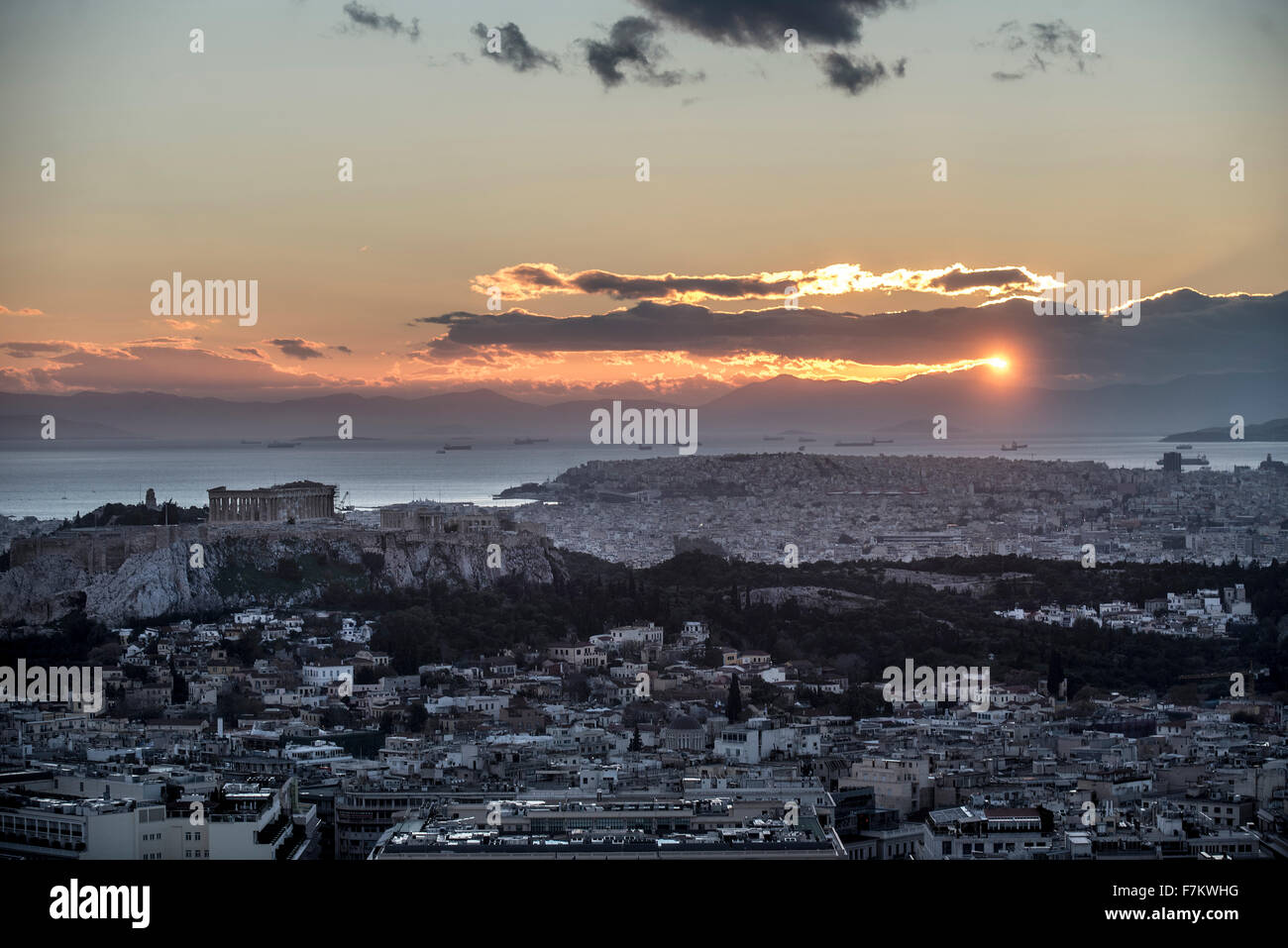 Sunset over the Parthenon Temple on Acropolis Hill in Athens, Greece, on 28 November 2015 ...