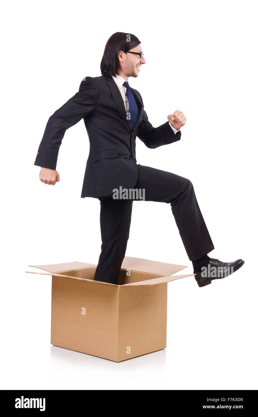 Man in thinking out of the box concept Stock Photo - Alamy
