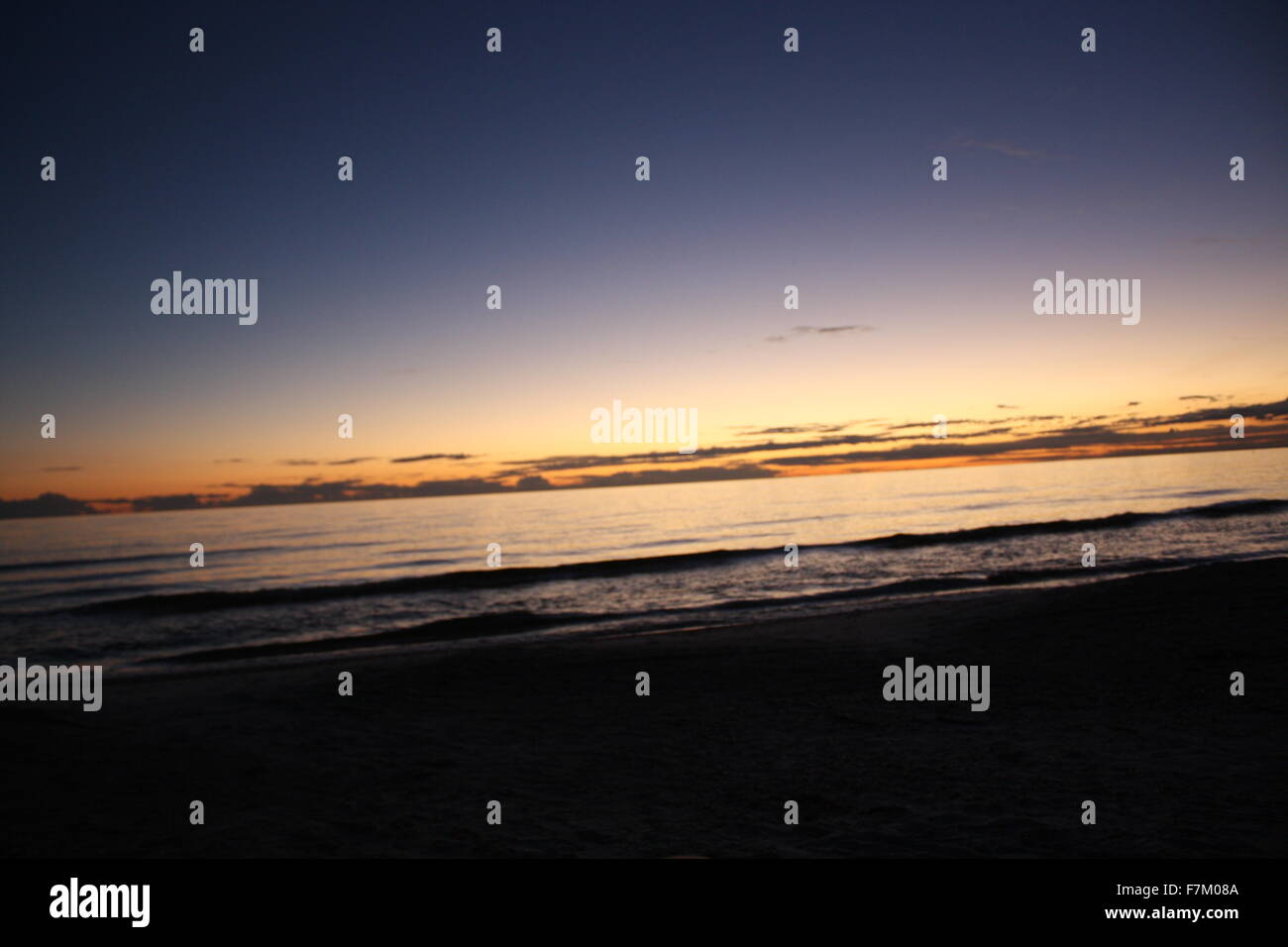 The Beach Post Sunset Stock Photo - Alamy