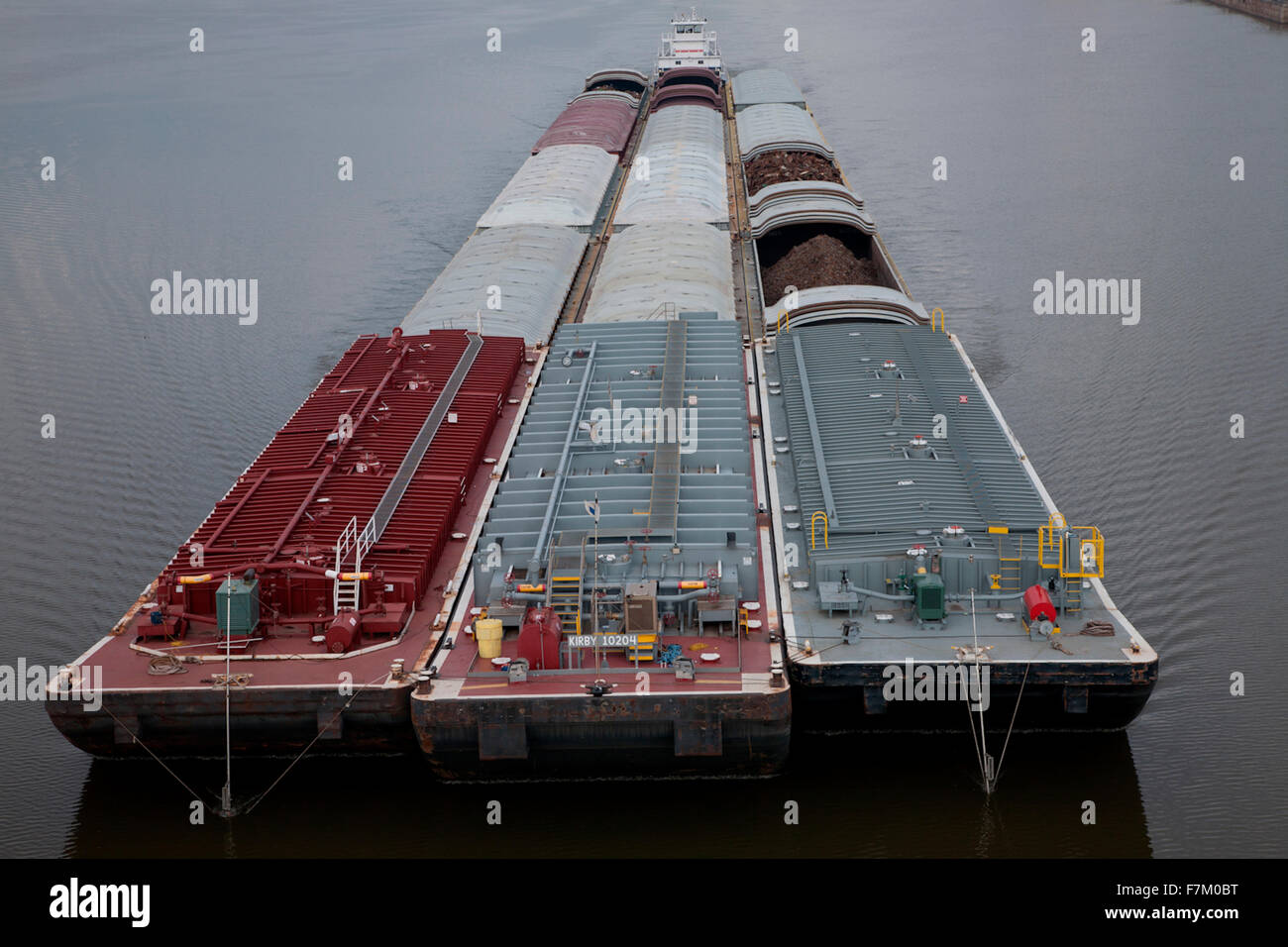 A river barge passes by Alton, Illinois down the Mississippi River and ...