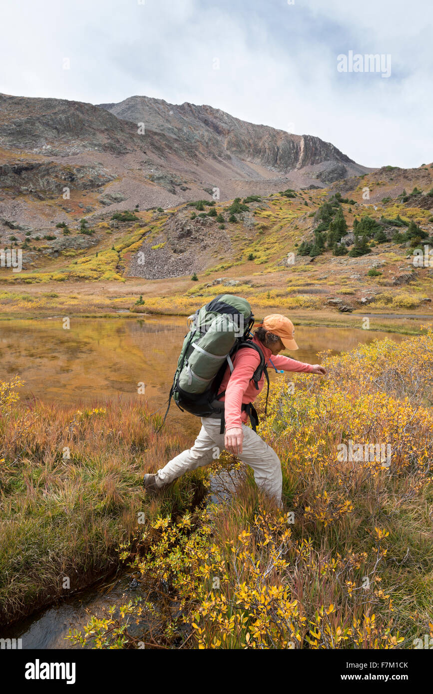 Stepping across hi-res stock photography and images - Alamy