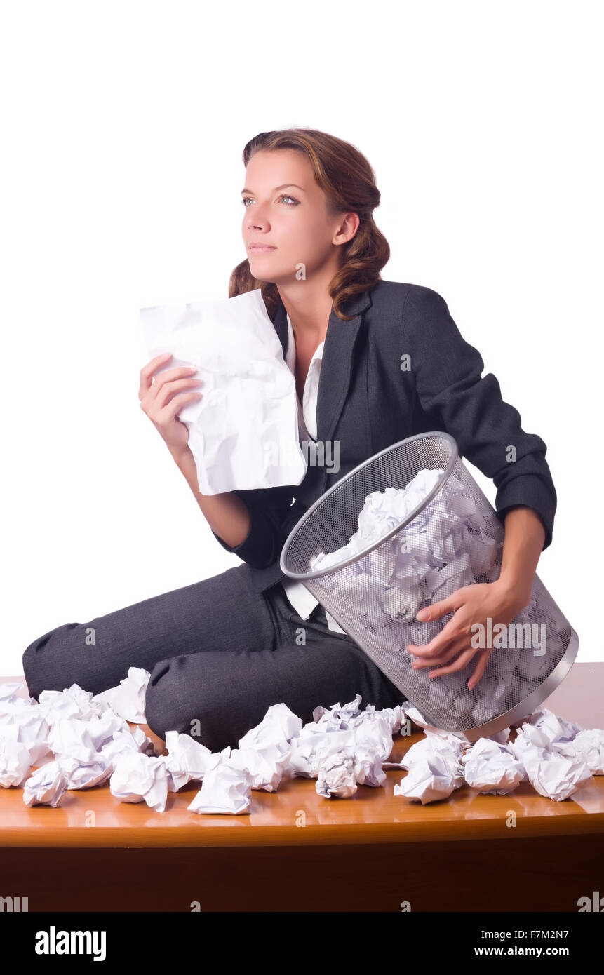 Woman with lots of discarded paper Stock Photo - Alamy