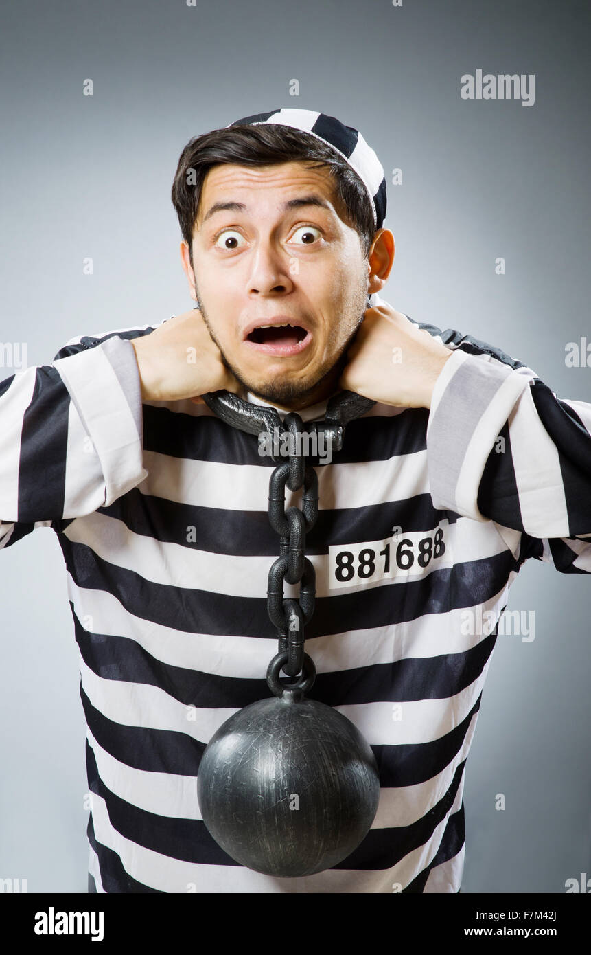 Funny prison inmate in concept Stock Photo - Alamy