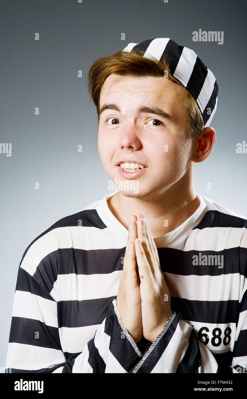 Funny prison inmate in concept Stock Photo - Alamy