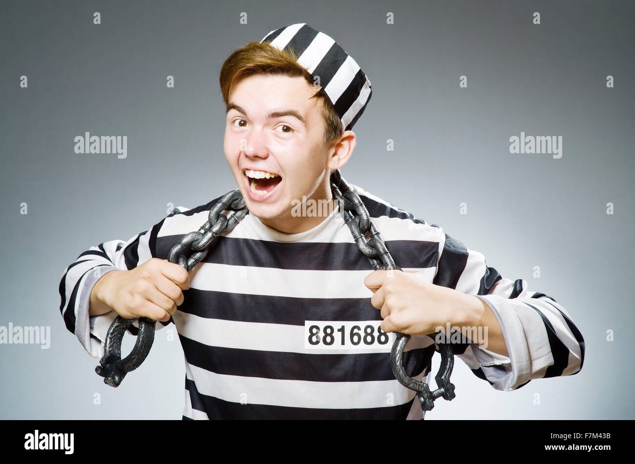 Funny prison inmate in concept Stock Photo - Alamy