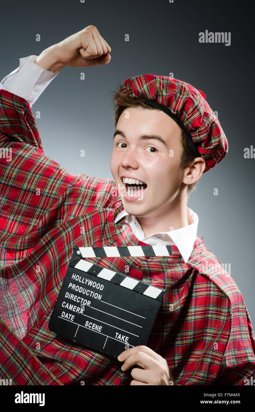 Funny scotsman with movie clapboard Stock Photo - Alamy