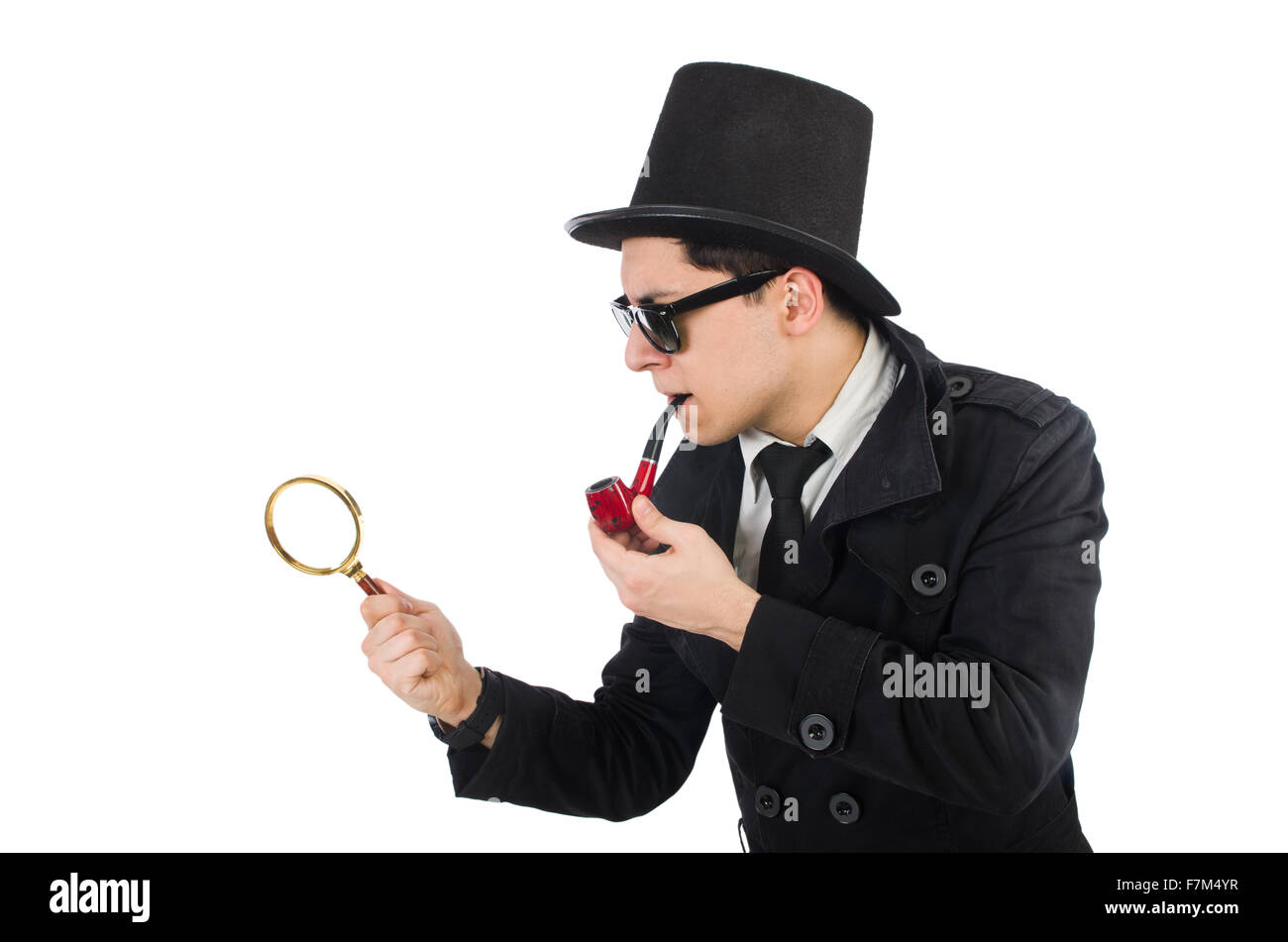 Young detective with pipe and magnifying glass Stock Photo - Alamy